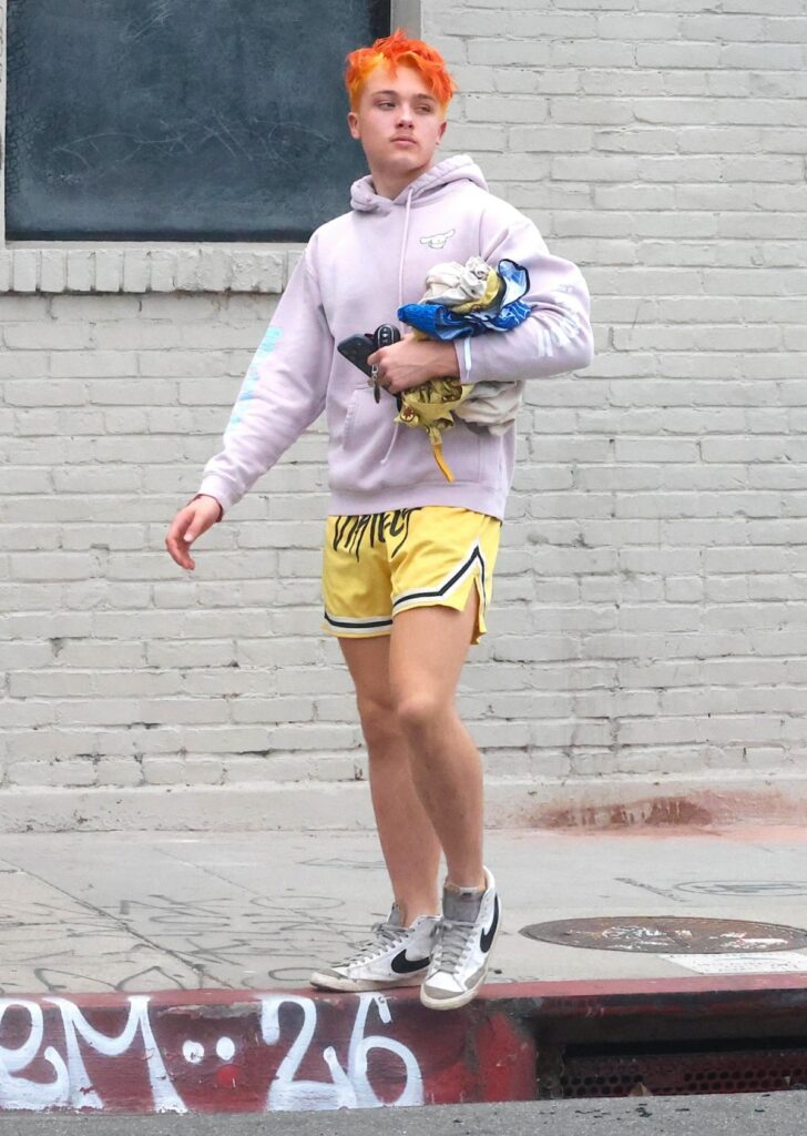 Knox Jolie (Pitt) stepped out with bright orange hair after a Muay Thai ...
